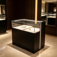China Wall Mounted Display Case with 50kg Per Shelf Weight Capacity, Adjustable Glass Shelves, and Top LED Spotlights And Strip Lighting for sale