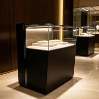 China Wall Mounted Display Case with 50kg Per Shelf Weight Capacity, Adjustable Glass Shelves, and Top LED Spotlights And Strip Lighting for sale