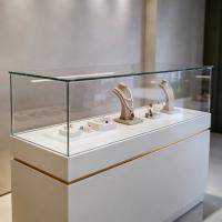 China Ventilated Back Panel Upright Display Case with Adjustable Glass Shelves and 50kg Per Shelf Weight Capacity for sale