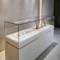 China Ventilated Back Panel Upright Display Case with Adjustable Glass Shelves and 50kg Per Shelf Weight Capacity for sale