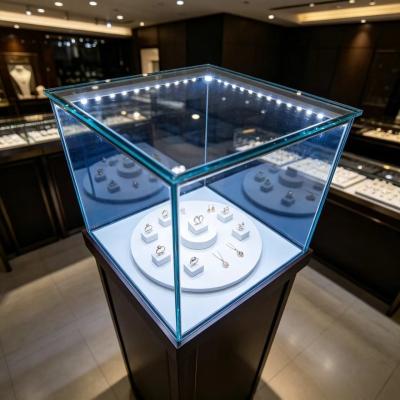 China Built-in Dimmable LED Lighting Jewelry Display Table with High-Security Locks and Matte White Exterior Finish for sale