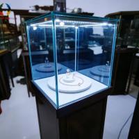 China Built-in Dimmable LED Lighting Jewelry Display Table with High-Security Locks and Matte White Exterior Finish for sale