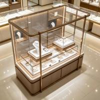 China Jewelry Display Table with Tempered Glass Shelving High-Security Locks and Ample Hidden Storage for sale