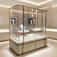 China Jewelry Display Table with Tempered Glass Shelving High-Security Locks and Ample Hidden Storage for sale