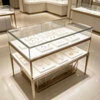 China 12 Compartments Jewelry Display Table with High-Security Locks and Matte White Exterior Finish for sale