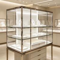 China 12 Compartments Jewelry Display Table with High-Security Locks and Matte White Exterior Finish for sale