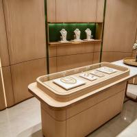 China 50kg Per Shelf Luxury Front Showcase with Dimmable Warm LED Lighting and Sliding Front Doors for Elegant Jewelry Display for sale