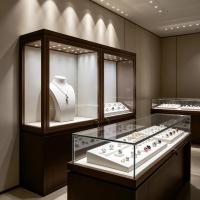 China Champagne Gold Jewelry Shop Design with 1.1 CBM Volume Display Case and 12V Output Voltage Shatter-resistant Tempered Glass for sale