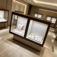 China Champagne Gold Jewelry Shop Design with 1.1 CBM Volume Display Case and 12V Output Voltage Shatter-resistant Tempered Glass for sale