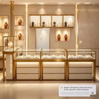 China Luxury Front Showcase with Sliding Front Doors 50kg Per Shelf Weight Capacity and Dimmable Warm LED Lighting for sale