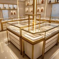China Luxury Front Showcase with Sliding Front Doors 50kg Per Shelf Weight Capacity and Dimmable Warm LED Lighting for sale