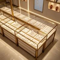 China Luxury Front Showcase with Sliding Front Doors 50kg Per Shelf Weight Capacity and Dimmable Warm LED Lighting for sale