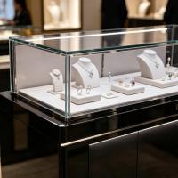 China Wall Mounted Display Case with 50kg Shelf Capacity Front Opening Soft-Close Doors and LED Lighting for sale