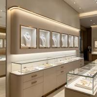 China Wall Mounted Display Case with 50kg Per Shelf Weight Capacity, Built-in LED Lighting System, and Adjustable Glass Shelves for sale