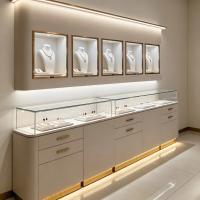 China Wall Mounted Display Case with 50kg Per Shelf Weight Capacity, Built-in LED Lighting System, and Adjustable Glass Shelves for sale