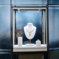 China Luxury Jewelry Store Layout with Full-length Mirrors Near Display, Polished Marble Flooring, and Backlit Logo Sign for sale