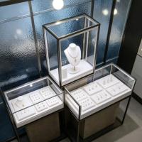 China Luxury Jewelry Store Layout with Full-length Mirrors Near Display, Polished Marble Flooring, and Backlit Logo Sign for sale
