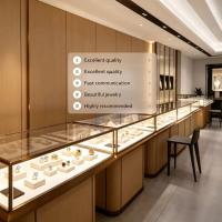 China Customized Upright Display Case with Black Powder Coated Finish Sliding Glass Doors and Adjustable Glass Shelves for sale