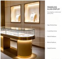 China Rose Gold Stainless Steel Upright Display Case with Front Opening Soft-Close Mechanism and Adjustable Glass Shelves for sale