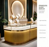 China Rose Gold Stainless Steel Frame Upright Display Case with Sliding Glass Doors and Adjustable Glass Shelves for sale