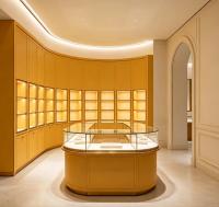 China Customized Wall Mounted Display Case with Adjustable Glass Shelves and Built-in LED Lighting System for sale