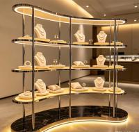 China Customized Wall Mounted Display Case with Matte Black Stainless Steel Frame, 3 Adjustable Shelves, and Built-in High CRI LED Lighting for sale