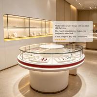 China Modern Jewelry Shop Design with White and Gold Color Scheme Aluminium Frame and Polished Marble Flooring for sale