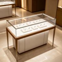 China White And Gold Color Scheme Modern Jewelry Shop Interior with Textured Wallpaper and LED Spotlights for sale