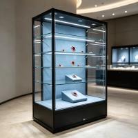 China Tempered Glass Jewelry Display Table with Lockable Compartments and Dimmable High-CRI LED Lighting for sale