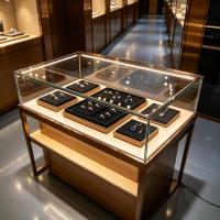 China Tempered Glass Jewelry Display Table with Dimmable High-CRI LED Lighting and Built-in Key Lock for Secure Showcases for sale