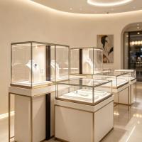China Tempered Glass And Stainless Steel Jewelry Counter No Assembly Required Modern Display Counter Suitable For Jewelry Shops for sale