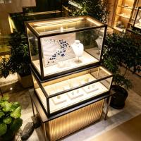 China Luxury Front Showcase with Front Opening Soft-Close Mechanism, 5 Adjustable Glass Shelves, and Customized Dimensions for sale