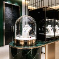 China Secure Key Lock Jewelry Counter with Hidden LED Strip Lighting and Marble Tabletop for Elegant Jewelry Display for sale
