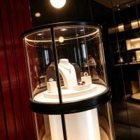 China Wooden Jewelry Display Counter with Secure Key Lock Marble Tabletop and Hidden LED Strip Lighting for sale
