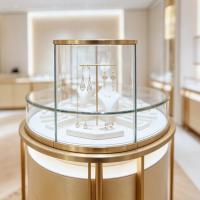 China Eco-Friendly Luxury Front Showcase with Sliding Front Doors and Adjustable Glass Shelves for sale