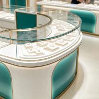 China Durable Stainless Steel Upright Display Case with Built-in LED Strip Lights and Adjustable Glass Shelves for sale
