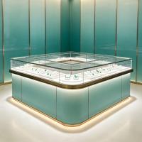 China Durable Stainless Steel Upright Display Case with Built-in LED Strip Lights and Adjustable Glass Shelves for sale
