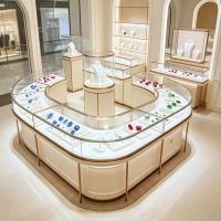 China Secure Key Lock Jewelry Counter With Tempered Glass And Stainless Steel Featuring Hidden LED Strip Lighting for sale