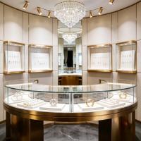 China 3 Adjustable Shelves Jewelry Display Counter with Tempered Glass and Stainless Steel Featuring Hidden LED Strip Lighting for sale