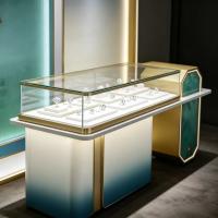 China Waterproof Island Display Cabinet with Round Island Design and Built-In Storage Drawers for Commercial Spaces for sale