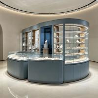 China Customized Item Shape Wall Mounted Display Case with Top LED Spotlights And Strip Lighting and 50kg Per Shelf Weight Capacity for sale