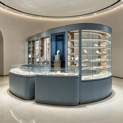 China Customized Item Shape Wall Mounted Display Case with Top LED Spotlights And Strip Lighting and 50kg Per Shelf Weight Capacity for sale