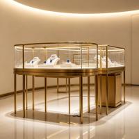 China Luxury Front Showcase with 5 Adjustable Glass Shelves Secure Magnetic Lock and LED Lighting for Clothing Display for sale
