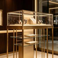 China Luxury Front Showcase with 5 Adjustable Glass Shelves Secure Magnetic Lock and LED Lighting for Clothing Display for sale