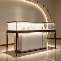 China Freestanding Island Display Cabinet with Brushed Champagne Gold Metal Finish and 360° Panoramic Display in Museum-Grade Construction for sale