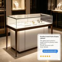 China Freestanding Island Display Cabinet with Brushed Champagne Gold Metal Finish and 360° Panoramic Display in Museum-Grade Construction for sale