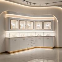 China Lockable Jewelry Display Table with Built-in LED Strip Lighting, High-Security Locks, and 12 Display Compartments for sale