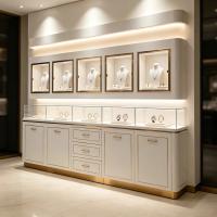 China Lockable Jewelry Display Table with Built-in LED Strip Lighting, High-Security Locks, and 12 Display Compartments for sale