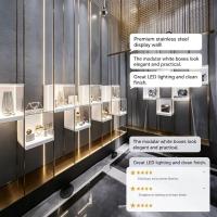 China Artificial Stone Finish Jewelry Counter with White LED Luminous Base and Secure Lock With Key for Elegant Showroom Display for sale