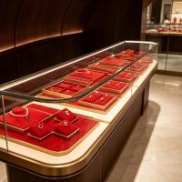 China Lockable Jewelry Display Table with Built-in LED Strip Lighting Velvet Lined Drawers and Rust-proof Gold Metal Frame for sale